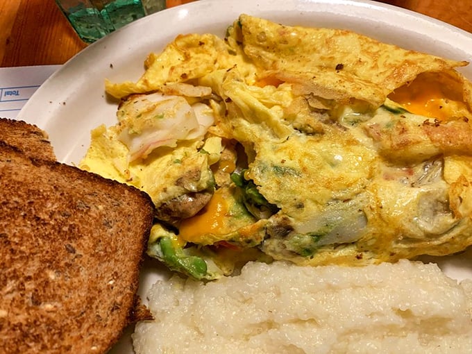 An omelet stuffed with more fillings than your average novel has plot twists. Each bite tells a different delicious story.
