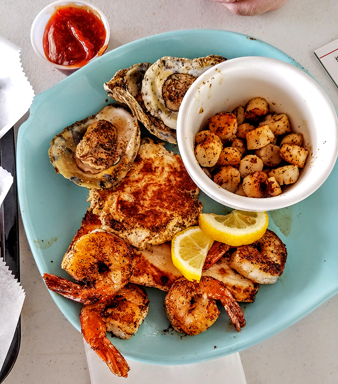 A seafood medley that would make Neptune himself jealous. Those grilled oysters are the unsung heroes of this plate.