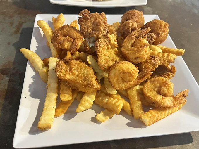 Golden-fried seafood perfection that would make coastal chefs nod in approval. The crunch you hear when biting in is the sound of vacation.