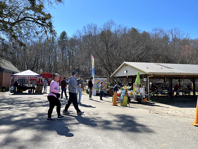 Weekend warriors on the hunt! Early birds navigate the market's pathways with the determined look of people who know exactly what they're not looking for.