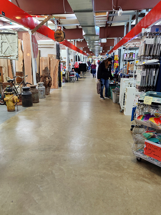 Serious shoppers examine potential treasures with the careful attention of museum curators selecting masterpieces.