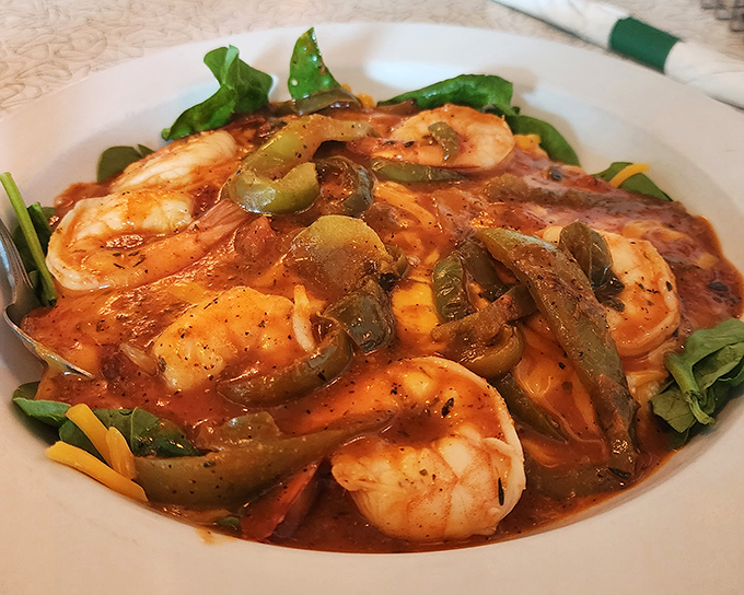 Shrimp and grits elevated to an art form, proving Southern comfort knows no geographical boundaries.