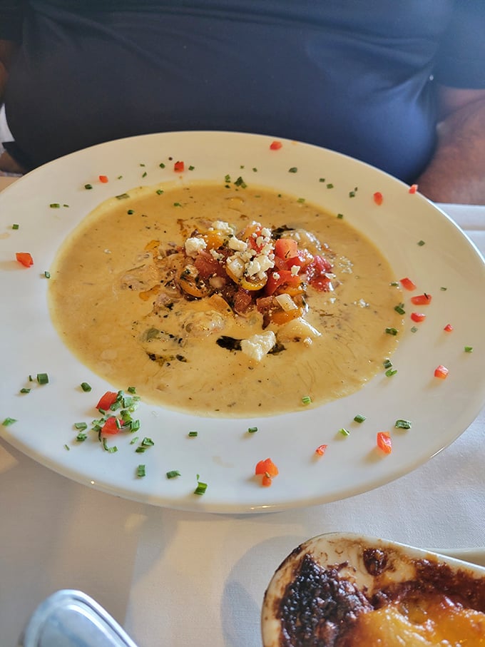 A bowl of shrimp and grits so comforting it could end family feuds. The South's greatest contribution to world peace, served with a spoon.