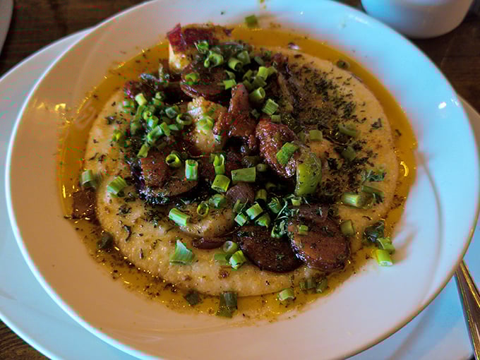 Shrimp and grits that would make Charleston jealous. That pork belly on top? It's the culinary equivalent of adding a surprise guitar solo to your favorite song.