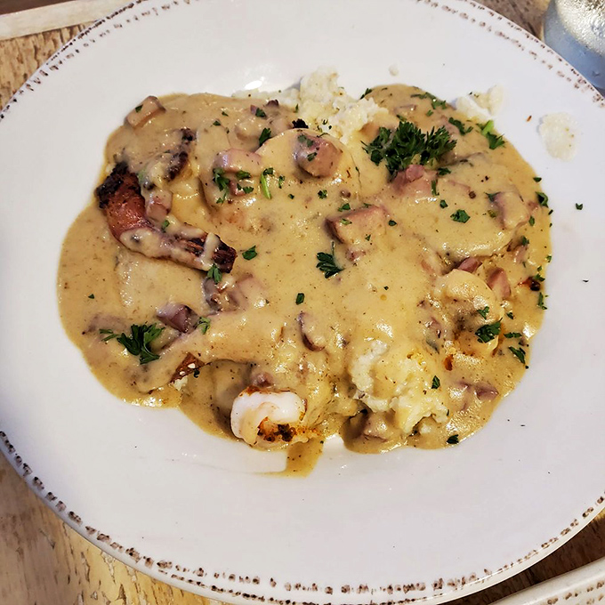 Shrimp swimming in a sea of creamy grits&mdash;the South's greatest contribution to breakfast. Comfort food that feels like a warm embrace.