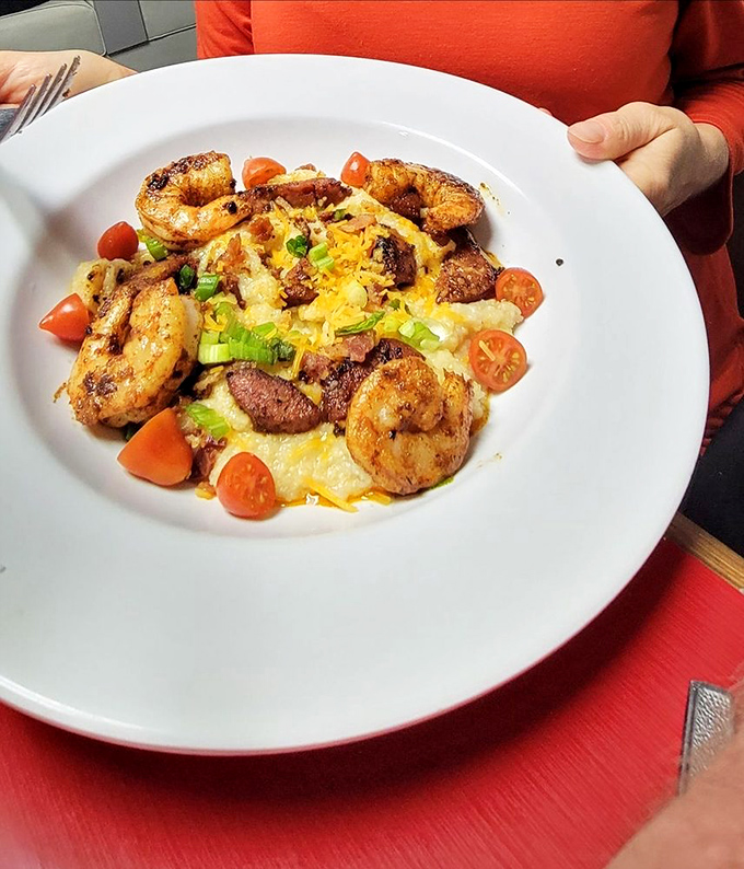 Shrimp and grits elevated to an art form, where each golden morsel tells a story of coastal comfort and Southern ingenuity.