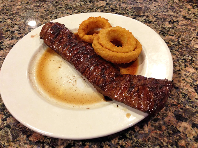Skirt steak and onion rings &ndash; the Fred Astaire and Ginger Rogers of diner cuisine, dancing together in perfect harmony on a simple white plate.