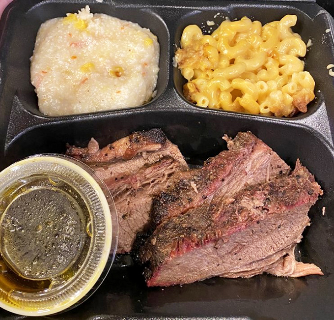 Brisket with that telltale pink smoke ring&mdash;nature's way of confirming you've made an excellent life choice today.