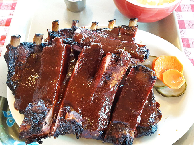 These ribs don't just fall off the bone—they practically leap into your mouth, glazed with a sauce worth bottling and taking home.