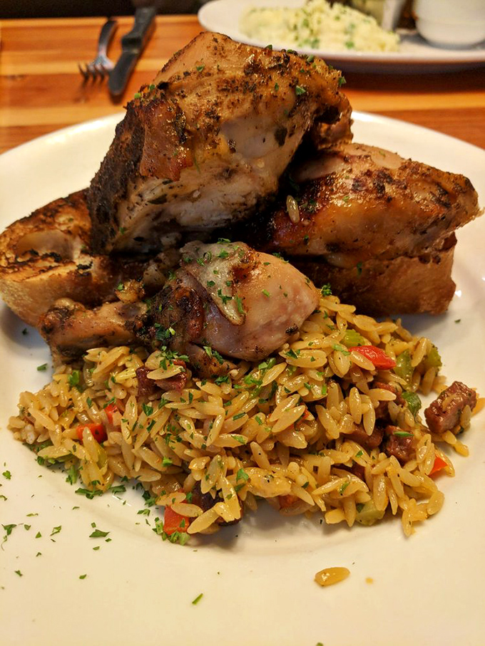 Rotisserie chicken that's had a spa day&mdash;herb-rubbed, perfectly roasted, and lounging on a bed of flavorful rice.
