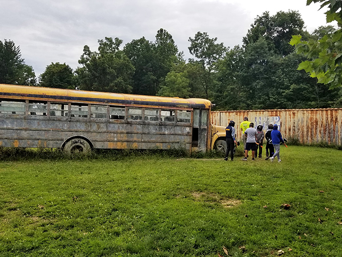 A glimpse of childhood adventure&mdash;this weathered school bus offers a mysterious backdrop for exploration, like something out of a Stephen King novel minus the scares.