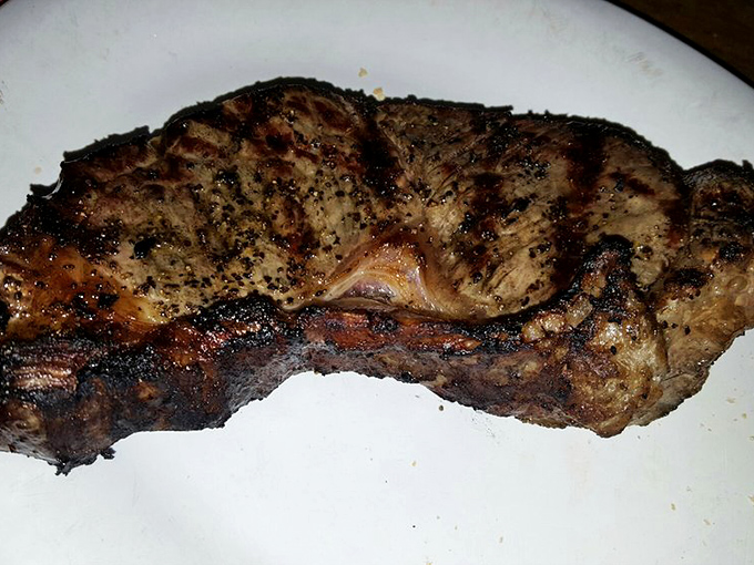 A steak with a story to tell – charred exterior, tender inside, and absolutely no need for Instagram filters.