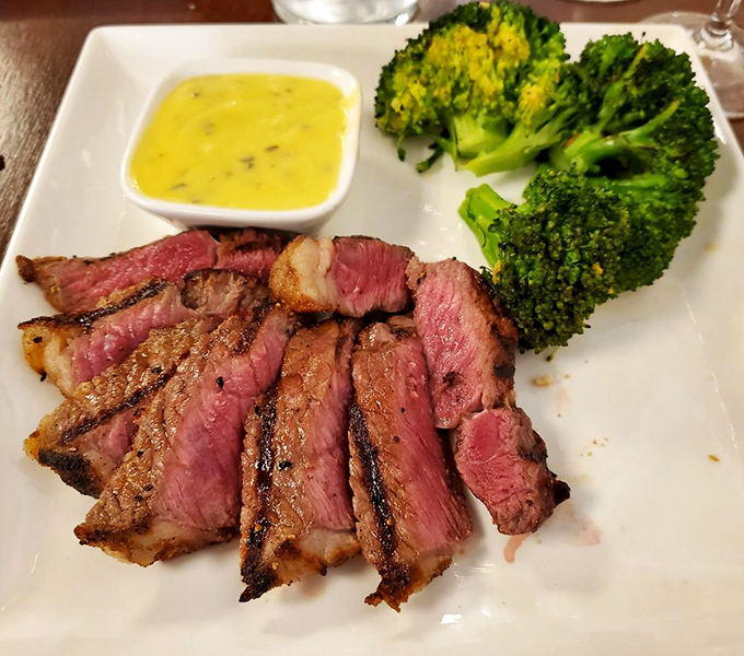 A perfectly medium-rare cut paired with bright broccoli&mdash;proof that sometimes the simplest combinations create the most profound pleasure.