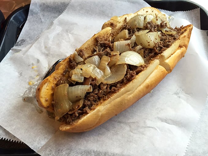 The classic steak sandwich with onions &ndash; no fancy garnishes needed when the fundamentals are executed with this level of respect and precision.