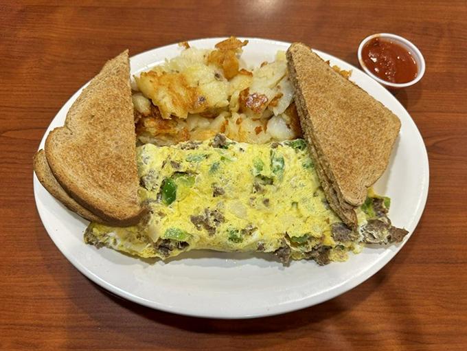 This isn't just breakfast&mdash;it's edible architecture. Layers of eggs, meat, and vegetables stacked with the precision of a Pennsylvania Dutch barn-raising.