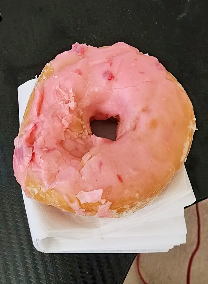 The strawberry donut wears its pink frosting like a badge of honor&mdash;crackly, sweet, and unapologetically old-school in the best possible way.