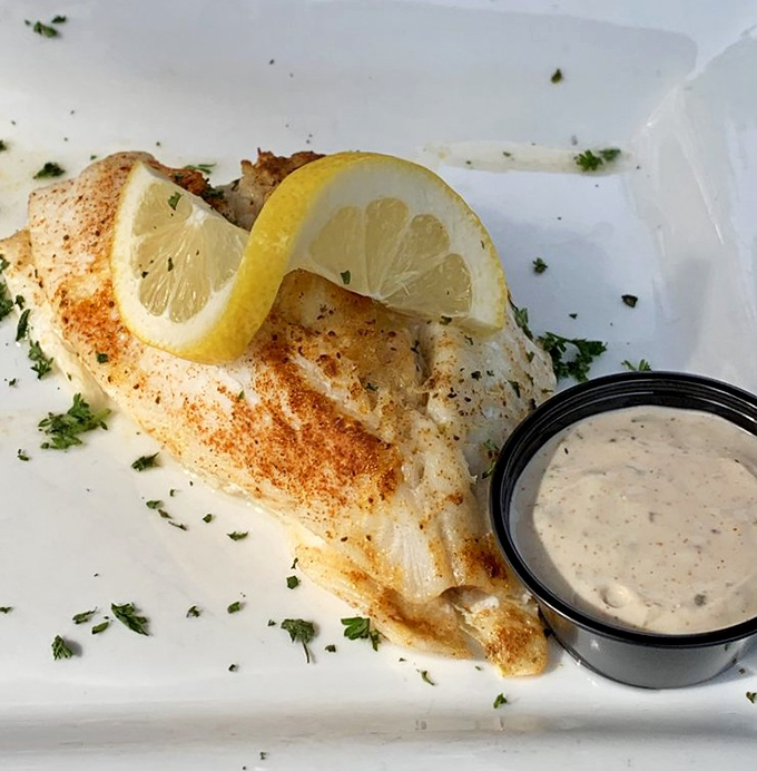 Stuffed flounder that looks like it just won a beauty pageant. That lemon wedge isn't garnish&mdash;it's a crown for seafood royalty.