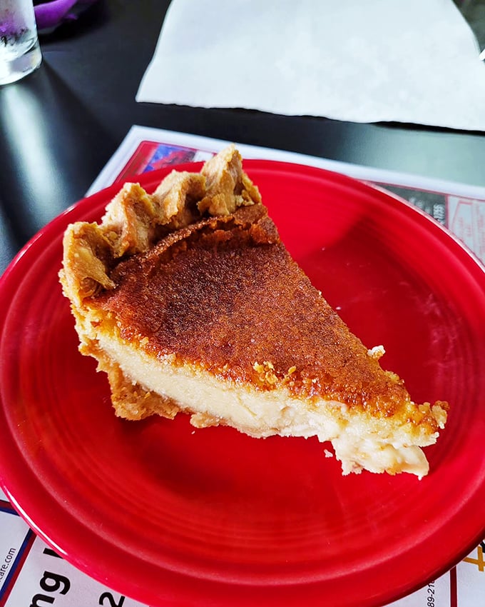 Indiana's official state pie, sugar cream, sitting pretty on its red plate&mdash;simple, sweet, and somehow more profound than desserts with twice the ingredients.