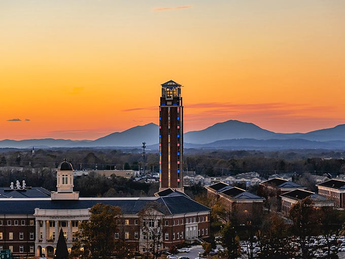 Liberty University's Freedom Tower pierces the sunset sky, standing sentinel over the Blue Ridge Mountains like a postcard come to life.