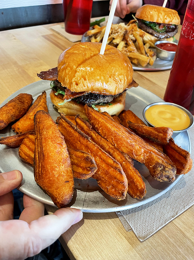Sweet potato wedges that look like they've been carved by someone who takes orange tubers very seriously. That golden-brown exterior is practically winking at you.