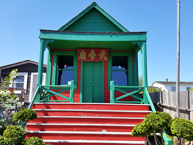 The Temple of Kwan Tai adds a splash of vibrant color and cultural heritage to Mendocino's landscape with its distinctive green and red facade.