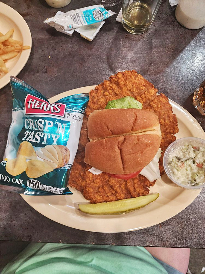 This tenderloin sandwich isn't messing around. The breading isn't hiding the meat&mdash;it's celebrating it, like a crispy golden frame around a masterpiece.