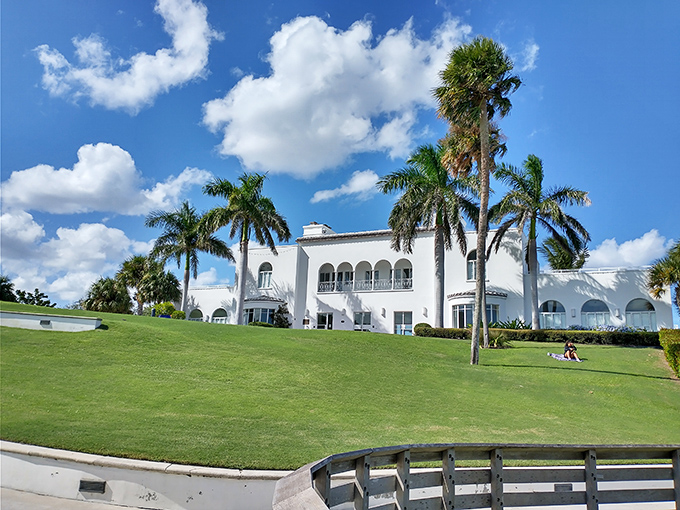 Old Florida grandeur that whispers tales of Gatsby-era soir&eacute;es. The Mansion at Tuckahoe stands as a Mediterranean dream against tropical skies.