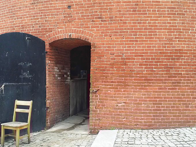 The unassuming entrance belies the industrial cathedral within. Like finding the door to Narnia, if Narnia manufactured ammunition instead of talking lions.