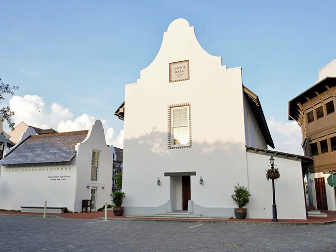 The town hall stands like a white wedding cake, making even paying parking tickets feel somehow elegant.