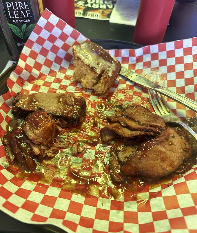 This tri-tip, brisket and cornbread trio isn't just a meal; it's the kind of plate that makes you contemplate moving to Lomita.