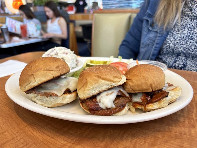 These tri-tip sliders aren't messing around—tender meat, melted cheese, and soft buns create the holy trinity of sandwich perfection.