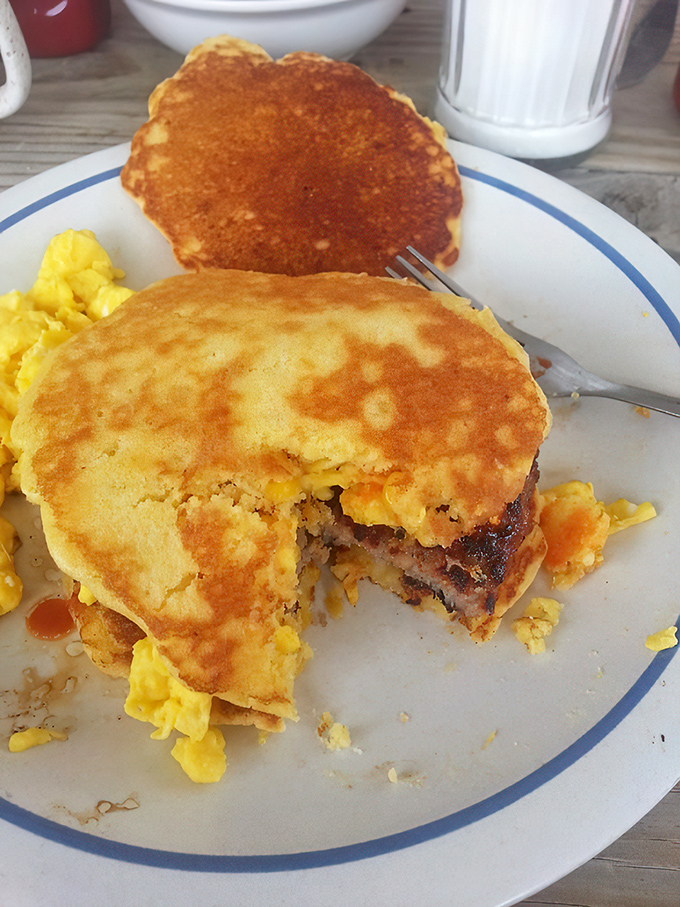 Sausage gravy that cascades over eggs like a savory waterfall&mdash;comfort food that speaks the universal language of "everything's gonna be okay."
