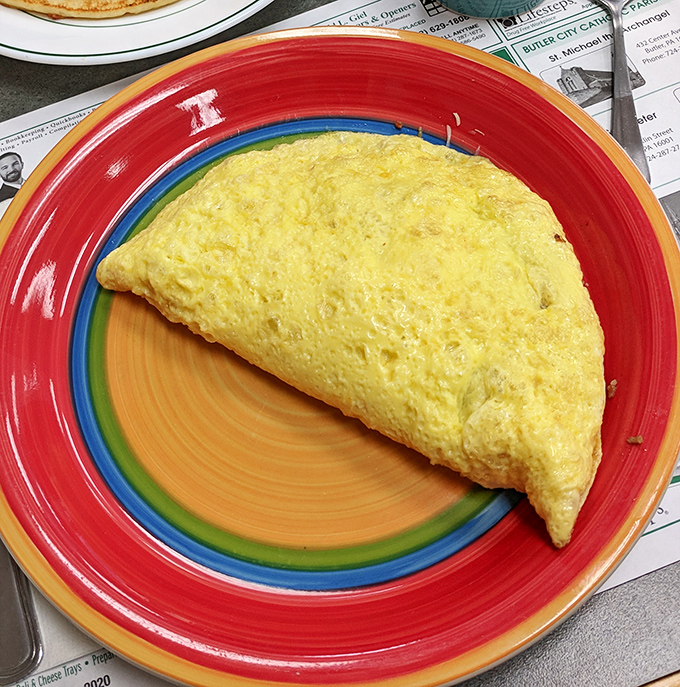 Fluffy doesn't begin to describe this omelet &ndash; it's like a yellow cloud that somehow captured all the best breakfast flavors in its pillowy embrace.