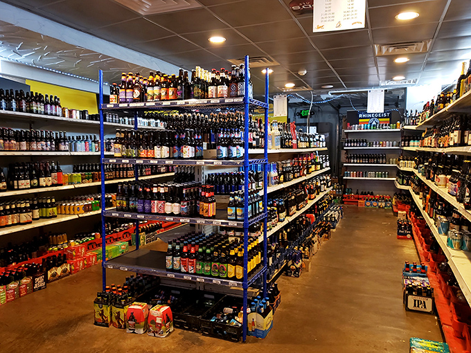 Not a beer aisle—a beer cathedral. Shelves stacked with liquid poetry from around the world, proving that paradise might actually exist in Swissvale, Pennsylvania.