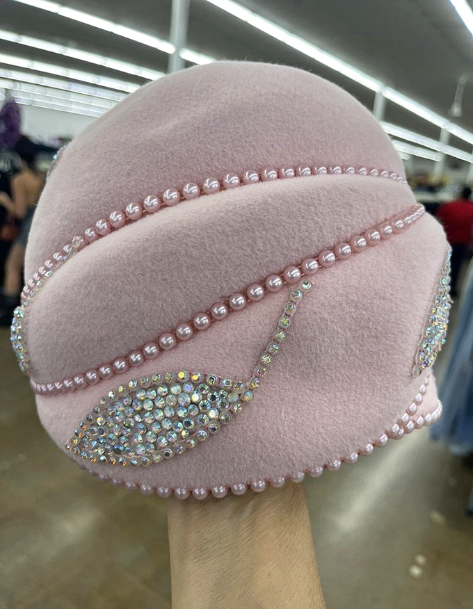 The glamour of bygone eras captured in pink felt and rhinestones. Audrey Hepburn would approve of this hat's second chance at turning heads.