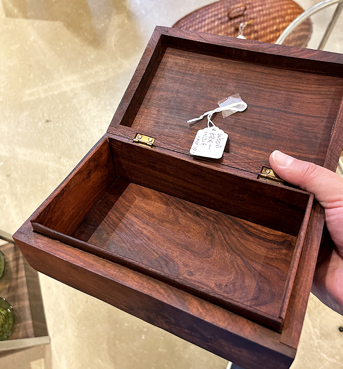 This isn't just a wooden box – it's a mystery container that once held love letters, secret recipes, or possibly pirate treasure.