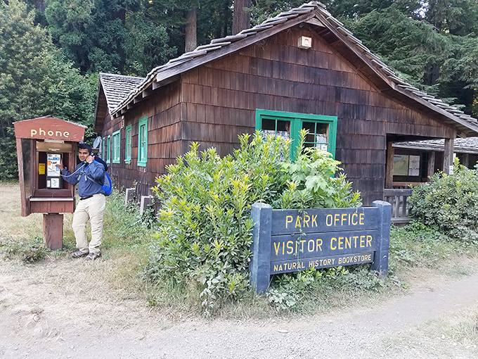 The rustic visitor center looks like it was designed by woodland elves. This cabin in the woods offers maps, not horror movie scenarios.