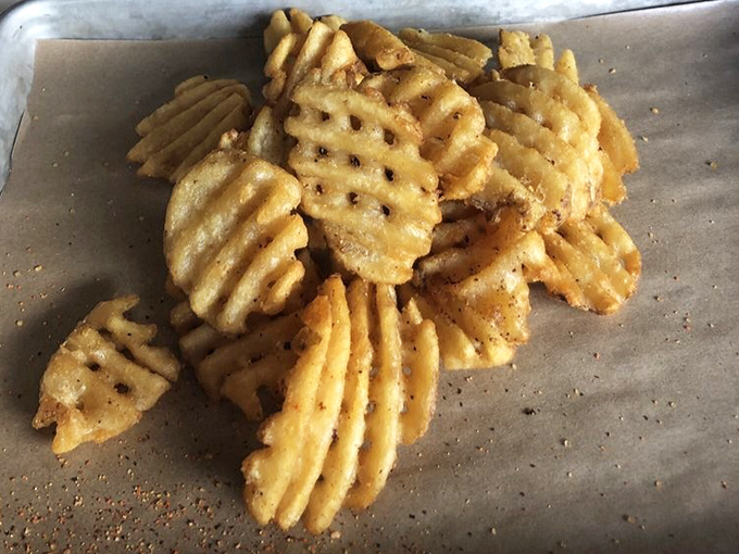 Waffle fries so perfectly seasoned and crispy, they'd make a French fry purist question everything they thought they knew about potatoes.