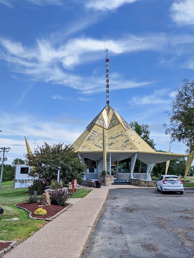 The pathway to the Wisconsin Pavilion invites visitors into a slice of World's Fair history that somehow landed in central Wisconsin.