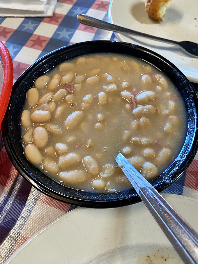 These white beans, simmered to creamy perfection, might not win any beauty contests, but they'll win your heart. Comfort food doesn't need to shout to make its point.