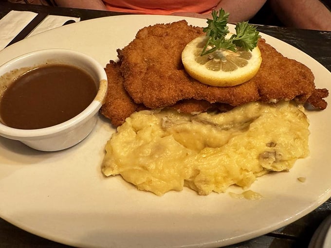 Wiener Schnitzel so perfectly golden it deserves its own Instagram account, with mashed potatoes that clearly never came from a box.