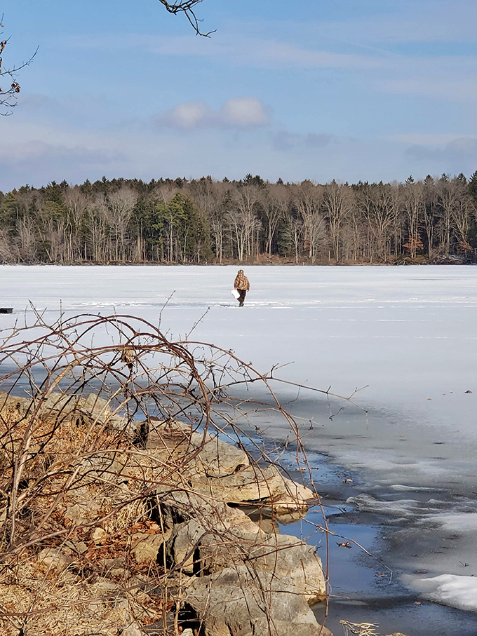 Winter transforms Pymatuning into a frozen frontier. That lone figure isn't just ice fishing&mdash;they're practicing the fine art of peaceful isolation.