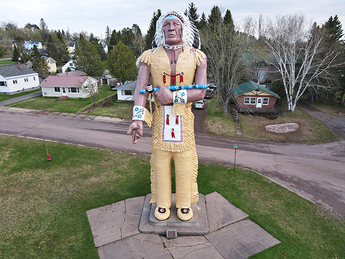Bird's eye brilliance! From this drone perspective, Hiawatha looks like he's about to step over the neighborhood houses like they're Monopoly pieces.