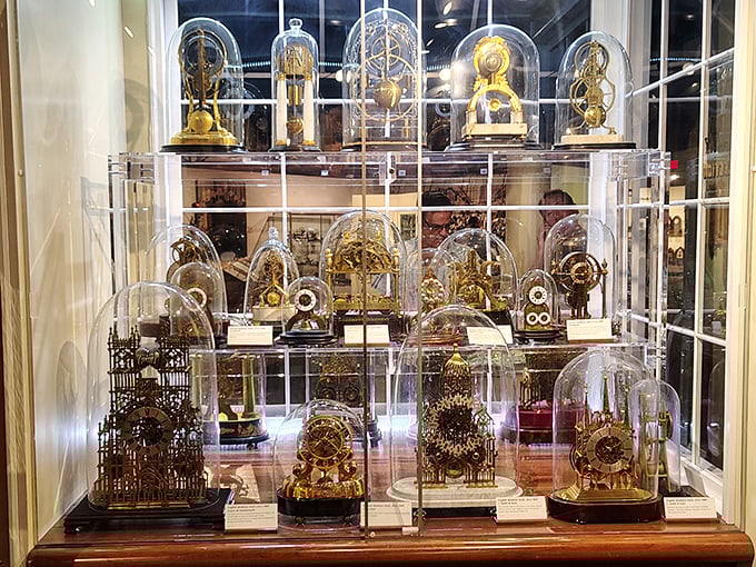 Delicate timepieces under glass domes—the horological equivalent of "look but don't touch." Each one a miniature mechanical universe of gears and springs.