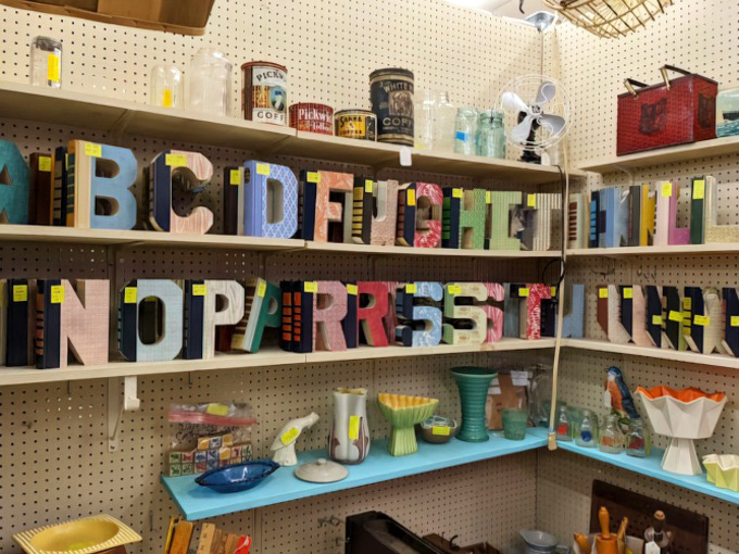 Colorful alphabet letters that once announced sales or decorated storefronts now wait for creative minds. Typography with history baked in.