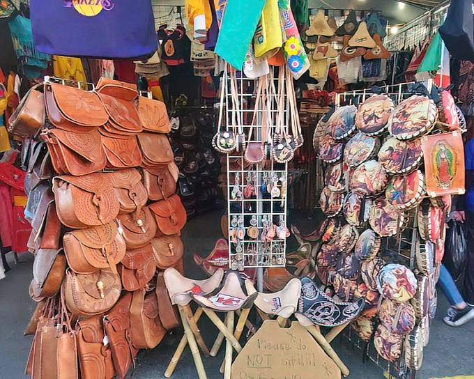 Leather craftsmanship on display with handcrafted bags and purses. Like a Southwestern bazaar, these stalls showcase artisanal goods at bargain prices.