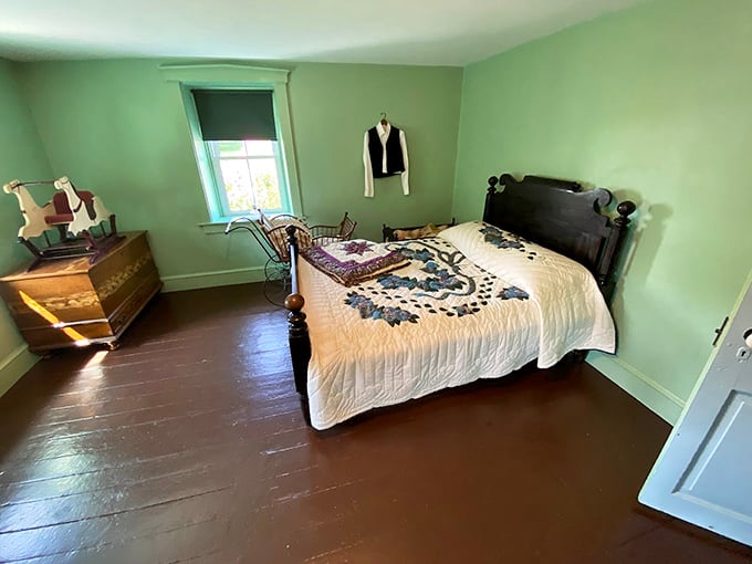 Minimalist bedroom design that Marie Kondo would approve&mdash;every item has purpose, function, and that handcrafted quilt definitely sparks joy.