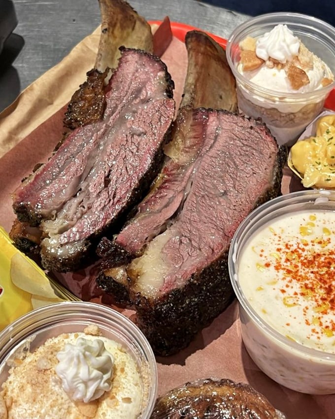 Beef ribs so massive they look like they came from a prehistoric cow. The bark-to-meat ratio here is what barbecue dreams are made of.
