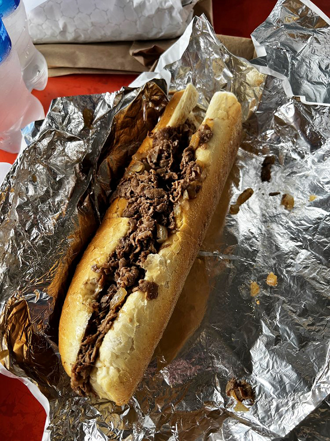 This cheesesteak isn't trying to impress you with fancy presentation&mdash;it's too busy being absolutely delicious in its foil throne.
