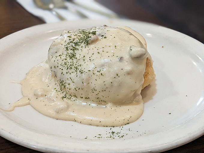 Biscuits and gravy &ndash; the comfort food equivalent of a warm hug from your favorite grandparent, with a sprinkle of herbs for that extra touch of love.